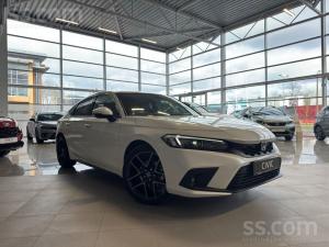 Balts Honda Civic 2024 Rīga, ar dzinēja tilpumu 2.00 L un nobraukumu 2 tūkst. km par 34790 €, foto  vietnē AUTOMOTO.COM.LV