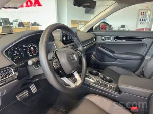 Balts Honda Civic 2024 Rīga, ar dzinēja tilpumu 2.00 L un nobraukumu 2 tūkst. km par 34790 €, foto 13 vietnē AUTOMOTO.COM.LV