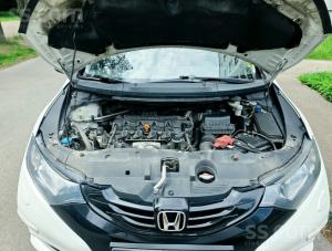 White Honda Civic 2014 in Jurmala, with an engine capacity of 1.80 L and mileage of 260 thousand km for 8050 €, photo 9 on AUTOMOTO.COM.LV