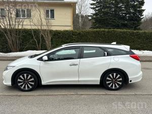 White Honda Civic 2014 in Jurmala, with an engine capacity of 1.80 L and mileage of 260 thousand km for 8050 €, photo 14 on AUTOMOTO.COM.LV