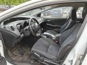White Honda Civic 2014 in Vilnius, with an engine capacity of 1.60 L and mileage of 420 thousand km for 3350 €, photo 20 on AUTOMOTO.COM.LV