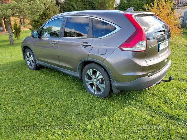 Beige Honda CR-V 2012 in Rapla, with an engine capacity of 2.00 L and mileage of 309 thousand km for 8000 €, photo 5 on AUTOMOTO.COM.LV