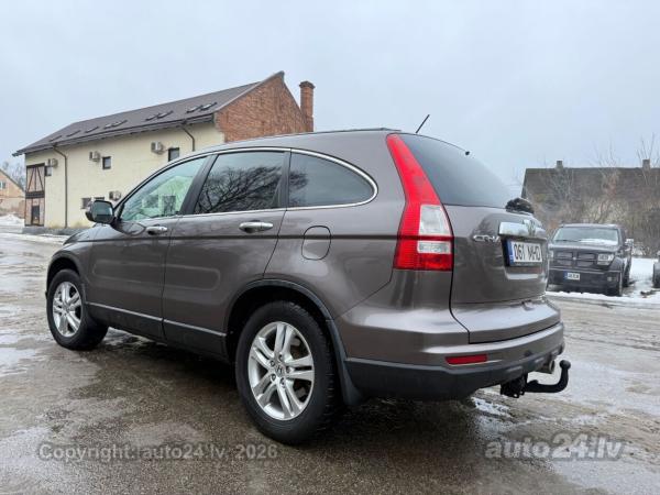 Beige Honda CR-V 2011 in Tartu, with an engine capacity of 2.00 L and mileage of 230 thousand km for 5950 €, photo 6 on AUTOMOTO.COM.LV