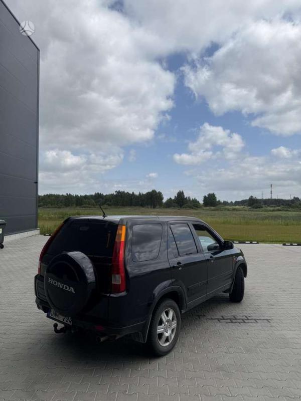 Melns Honda CR-V 2003 Šauļi, ar dzinēja tilpumu 2.00 L un nobraukumu 400 tūkst. km par 1950 €, foto 4 vietnē AUTOMOTO.COM.LV