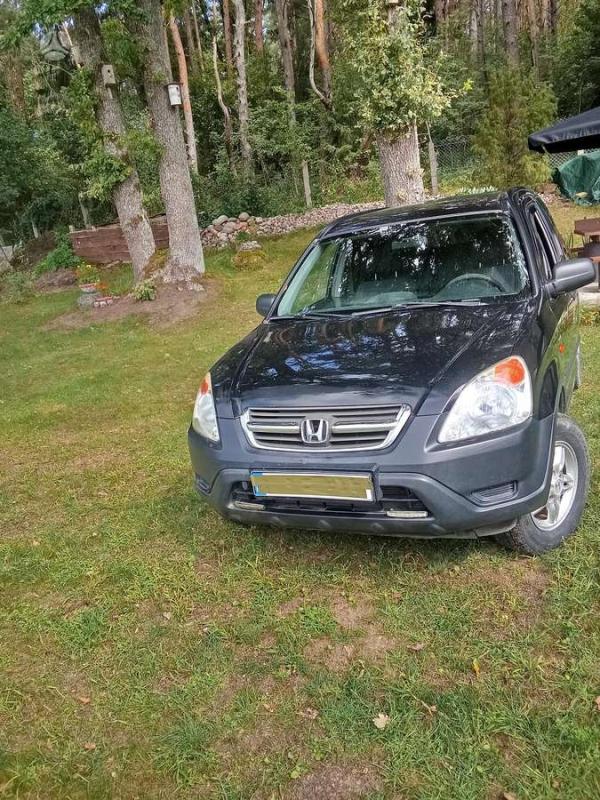 Black Honda CR-V 2003 in Jurbarkas, with an engine capacity of 2.00 L and mileage of 323 thousand km for 1500 €, photo 1 on AUTOMOTO.COM.LV