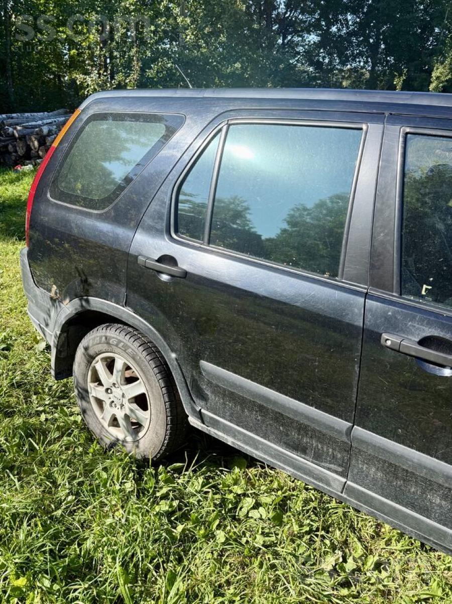 Melns Honda CR-V 2003 Dobele, ar dzinēja tilpumu 2.00 L un nobraukumu 327 tūkst. km par 550 €, foto 3 vietnē AUTOMOTO.COM.LV