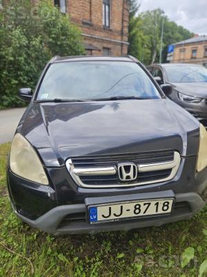 Black Honda CR-V 2003 in Riga, with an engine capacity of 2.00 L and mileage of 250 thousand km for 1000 €, photo  on AUTOMOTO.COM.LV