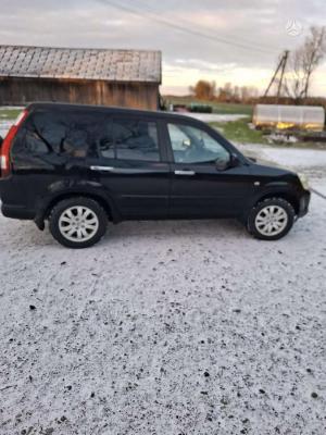Melns Honda CR-V 2005 Panevēža, ar dzinēja tilpumu 2.20 L un nobraukumu 300 tūkst. km par 2700 €, foto 2 vietnē AUTOMOTO.COM.LV