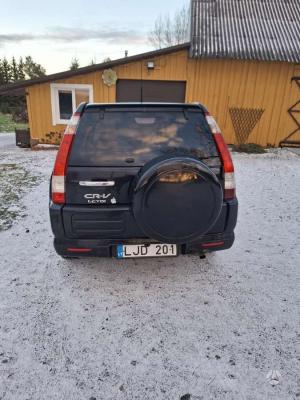 Melns Honda CR-V 2005 Panevēža, ar dzinēja tilpumu 2.20 L un nobraukumu 300 tūkst. km par 2700 €, foto 3 vietnē AUTOMOTO.COM.LV