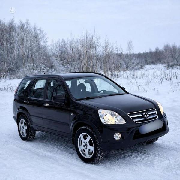 Black Honda CR-V 2005 in Vilnius, with an engine capacity of 2.20 L and mileage of 341 thousand km for 2999 €, photo 2 on AUTOMOTO.COM.LV