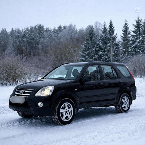 Black Honda CR-V 2005 in Vilnius, with an engine capacity of 2.20 L and mileage of 341 thousand km for 2999 €, photo 3 on AUTOMOTO.COM.LV
