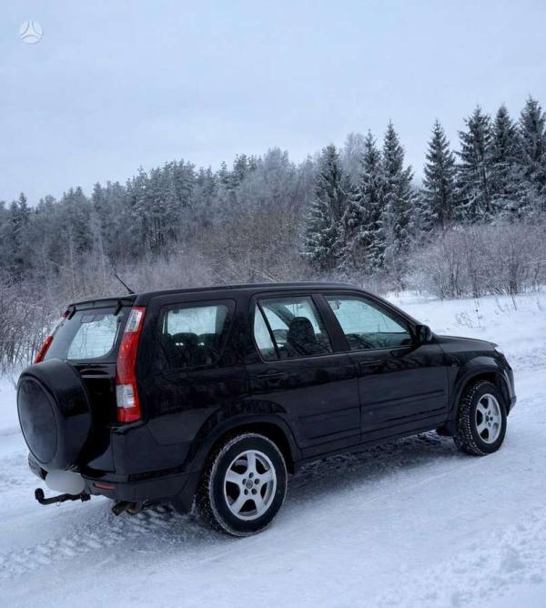 Black Honda CR-V 2005 in Vilnius, with an engine capacity of 2.20 L and mileage of 341 thousand km for 2999 €, photo 6 on AUTOMOTO.COM.LV
