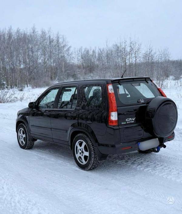 Black Honda CR-V 2005 in Vilnius, with an engine capacity of 2.20 L and mileage of 341 thousand km for 2999 €, photo 7 on AUTOMOTO.COM.LV