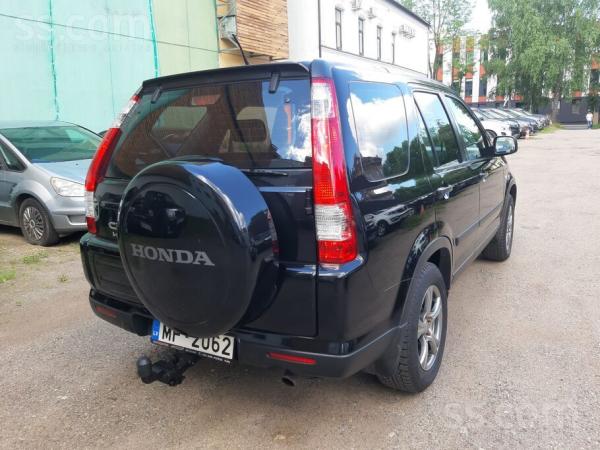 Black Honda CR-V 2005 in Daugavpils, with an engine capacity of 2.20 L and mileage of 0 thousand km for 3650 €, photo 6 on AUTOMOTO.COM.LV