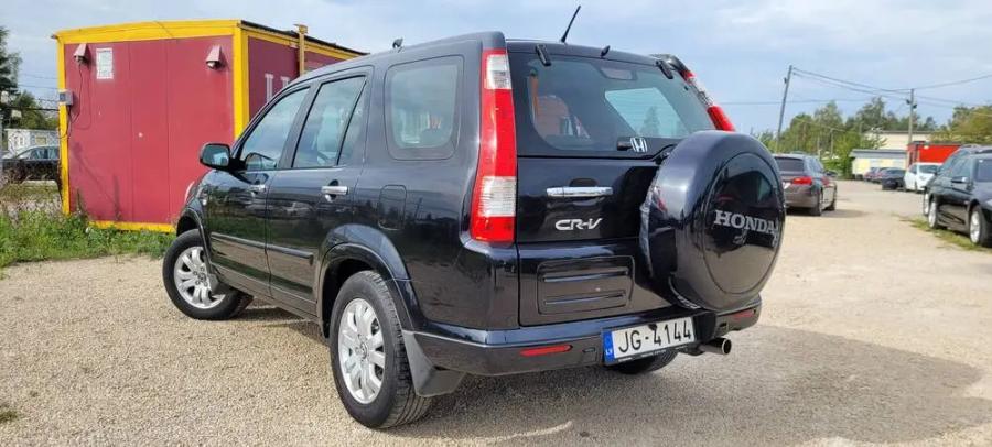 Black Honda CR-V 2005 in Riga, with an engine capacity of 2.00 L and mileage of 308 thousand km for 2990 €, photo 6 on AUTOMOTO.COM.LV