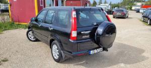 Black Honda CR-V 2005 in Riga, with an engine capacity of 2.00 L and mileage of 308 thousand km for 2990 €, photo 7 on AUTOMOTO.COM.LV