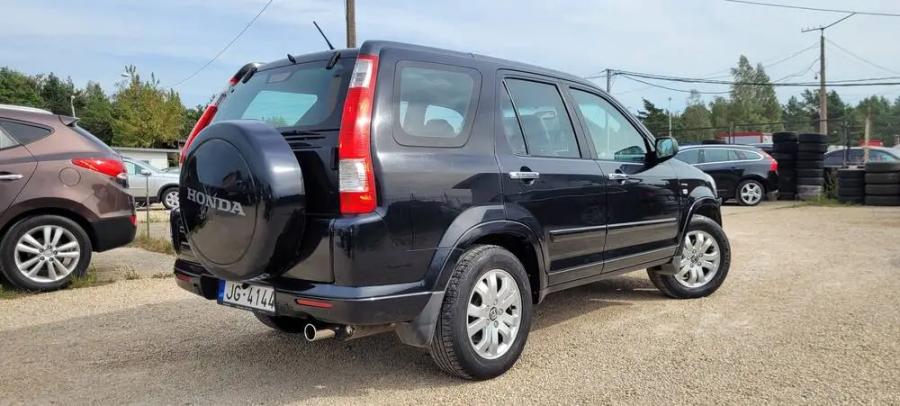Black Honda CR-V 2005 in Riga, with an engine capacity of 2.00 L and mileage of 308 thousand km for 2990 €, photo 9 on AUTOMOTO.COM.LV