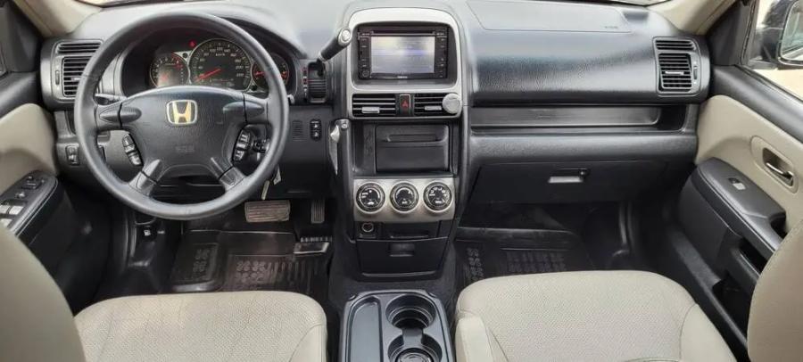 Black Honda CR-V 2005 in Riga, with an engine capacity of 2.00 L and mileage of 308 thousand km for 2990 €, photo 14 on AUTOMOTO.COM.LV
