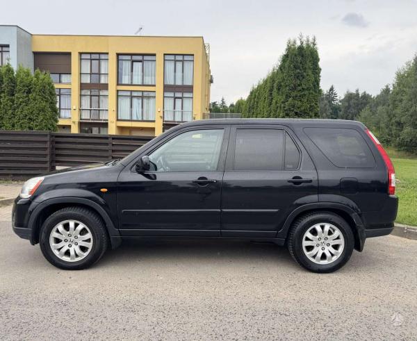 Melns Honda CR-V 2005 Viļņa, ar dzinēja tilpumu 2.40 L un nobraukumu 246 tūkst. km par 1750 €, foto 6 vietnē AUTOMOTO.COM.LV