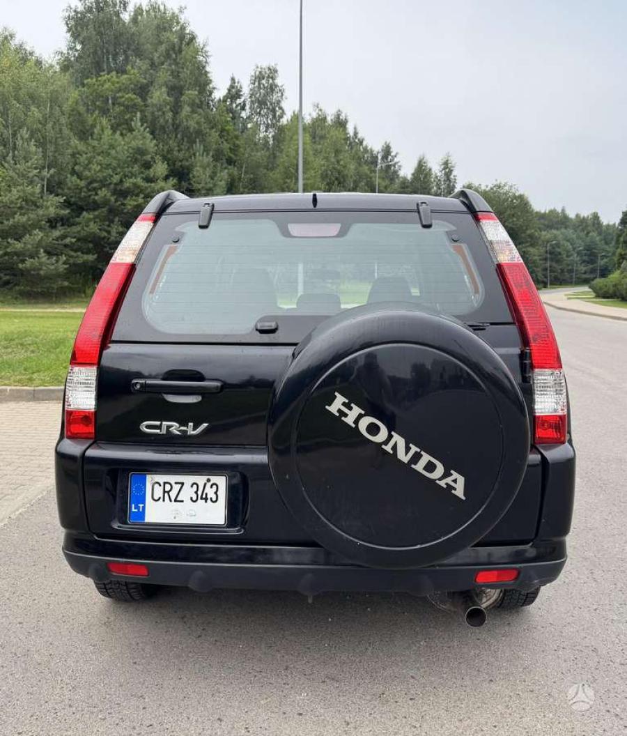 Black Honda CR-V 2005 in Vilnius, with an engine capacity of 2.40 L and mileage of 246 thousand km for 1750 €, photo 10 on AUTOMOTO.COM.LV