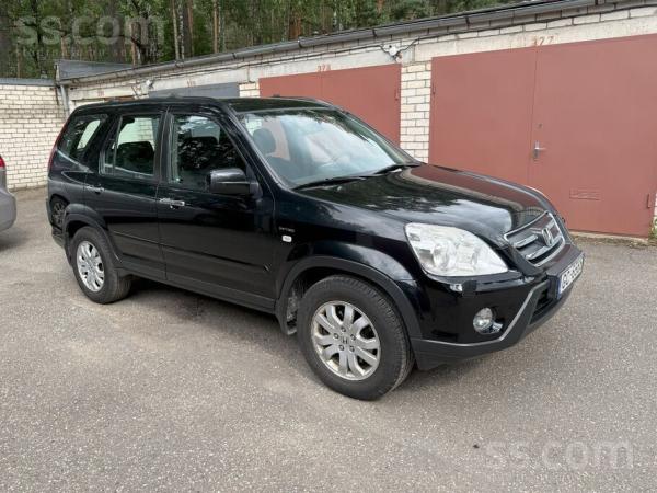 Black Honda CR-V 2006 in Riga, with an engine capacity of 2.00 L and mileage of 149 thousand km for 4499 €, photo 8 on AUTOMOTO.COM.LV