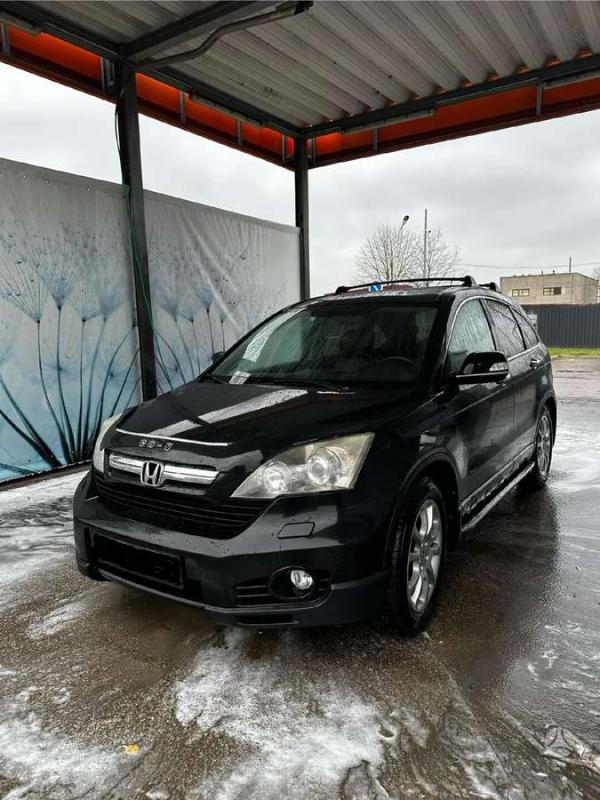 Black Honda CR-V 2006 in Kaunas, with an engine capacity of 2.00 L and mileage of 289 thousand km for 4100 €, photo 1 on AUTOMOTO.COM.LV