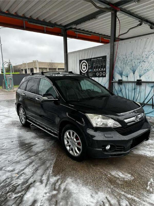 Black Honda CR-V 2006 in Kaunas, with an engine capacity of 2.00 L and mileage of 289 thousand km for 4100 €, photo 3 on AUTOMOTO.COM.LV