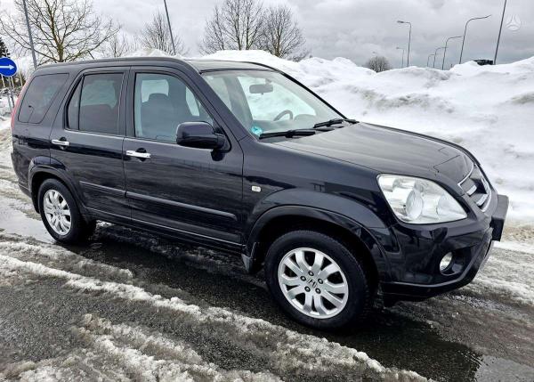 Melns Honda CR-V 2006 Klaipėda, ar dzinēja tilpumu 2.20 L un nobraukumu 294 tūkst. km par 3850 €, foto 2 vietnē AUTOMOTO.COM.LV