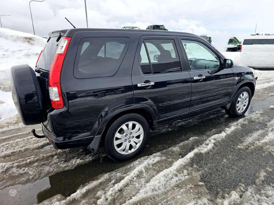 Black Honda CR-V 2006 in Klaipeda, with an engine capacity of 2.20 L and mileage of 294 thousand km for 3850 €, photo 4 on AUTOMOTO.COM.LV