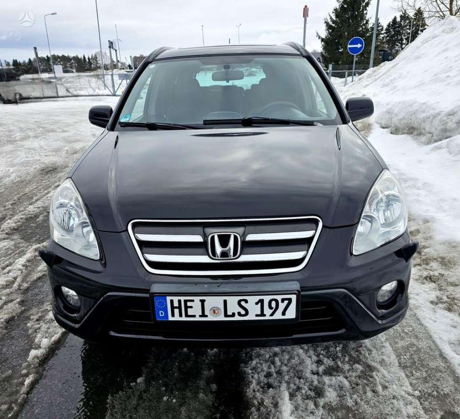 Black Honda CR-V 2006 in Klaipeda, with an engine capacity of 2.20 L and mileage of 294 thousand km for 3850 €, photo 7 on AUTOMOTO.COM.LV