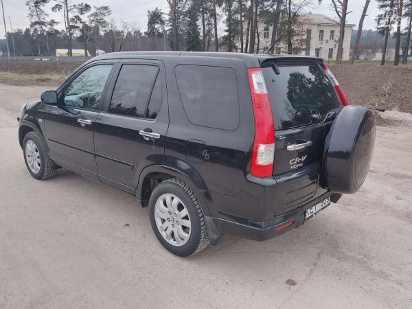 Black Honda CR-V 2006 in Vievis, with an engine capacity of 2.20 L and mileage of 450 thousand km for 3100 €, photo 2 on AUTOMOTO.COM.LV