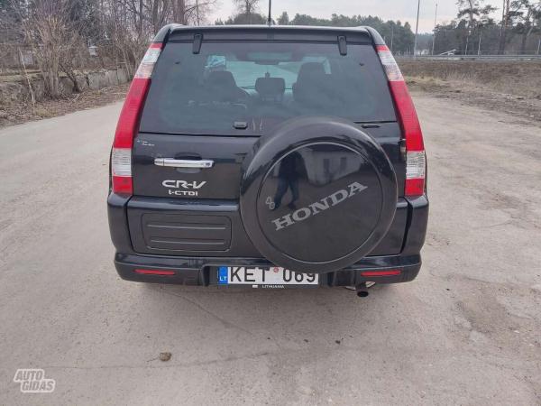 Black Honda CR-V 2006 in Vievis, with an engine capacity of 2.20 L and mileage of 450 thousand km for 3100 €, photo 3 on AUTOMOTO.COM.LV