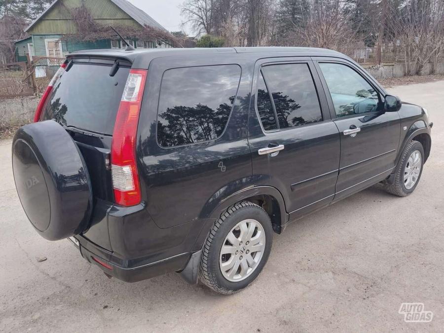 Melns Honda CR-V 2006 Vievis, ar dzinēja tilpumu 2.20 L un nobraukumu 450 tūkst. km par 3100 €, foto 4 vietnē AUTOMOTO.COM.LV