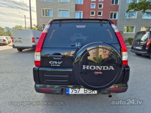 Black Honda CR-V 2006 in Tallinn, with an engine capacity of 2.20 L and mileage of 299 thousand km for 2499 €, photo 6 on AUTOMOTO.COM.LV