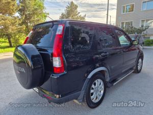 Black Honda CR-V 2006 in Tallinn, with an engine capacity of 2.20 L and mileage of 299 thousand km for 2499 €, photo 7 on AUTOMOTO.COM.LV