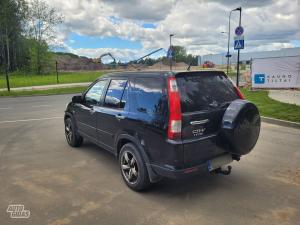 Black Honda CR-V 2006 in Vilnius, with an engine capacity of 2.20 L and mileage of 367 thousand km for 2650 €, photo 5 on AUTOMOTO.COM.LV