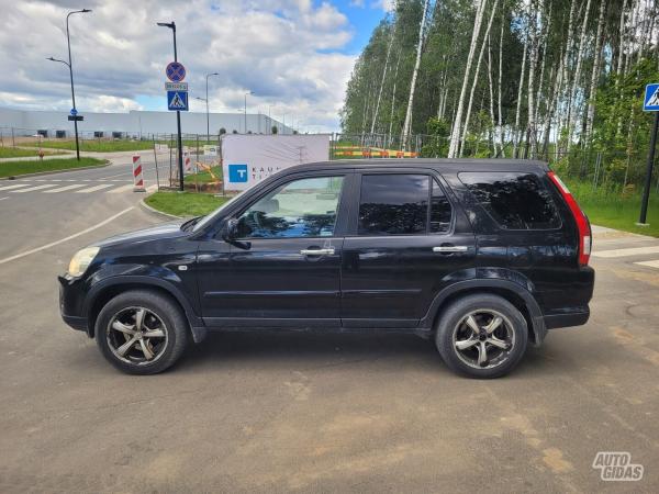 Black Honda CR-V 2006 in Vilnius, with an engine capacity of 2.20 L and mileage of 367 thousand km for 2650 €, photo 7 on AUTOMOTO.COM.LV