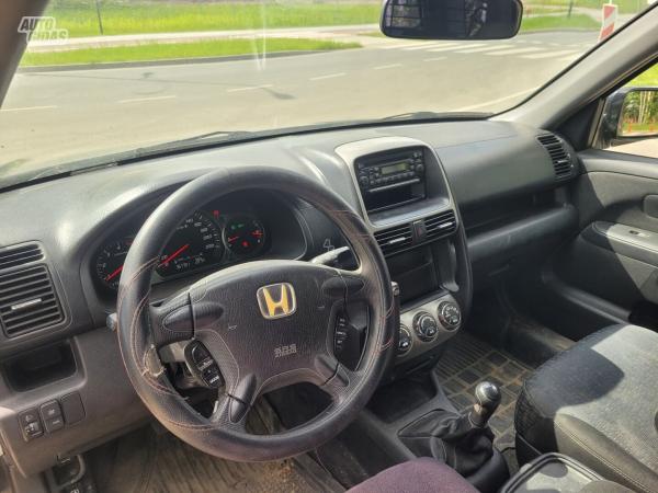 Black Honda CR-V 2006 in Vilnius, with an engine capacity of 2.20 L and mileage of 367 thousand km for 2650 €, photo 9 on AUTOMOTO.COM.LV