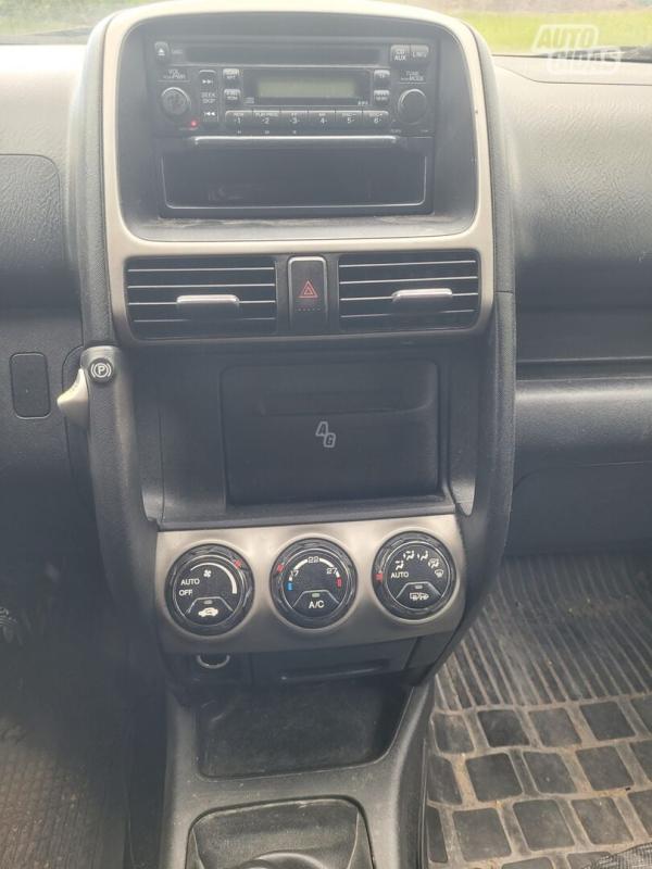 Black Honda CR-V 2006 in Vilnius, with an engine capacity of 2.20 L and mileage of 367 thousand km for 2650 €, photo 10 on AUTOMOTO.COM.LV