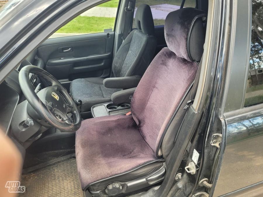 Black Honda CR-V 2006 in Vilnius, with an engine capacity of 2.20 L and mileage of 367 thousand km for 2650 €, photo 13 on AUTOMOTO.COM.LV