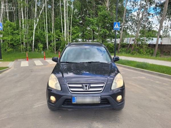 Black Honda CR-V 2006 in Vilnius, with an engine capacity of 2.20 L and mileage of 367 thousand km for 2450 €, photo 5 on AUTOMOTO.COM.LV