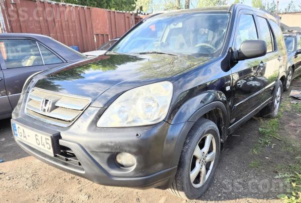 Melns Honda CR-V 2006 Rīga, ar dzinēja tilpumu 2.00 L un nobraukumu 401 tūkst. km par 1550 €, foto 1 vietnē AUTOMOTO.COM.LV