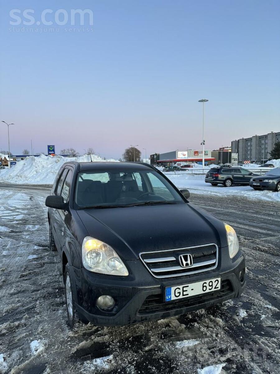 Melns Honda CR-V 2006 Rēzekne, ar dzinēja tilpumu 2.20 L un nobraukumu 243 tūkst. km par 2950 €, foto 1 vietnē AUTOMOTO.COM.LV