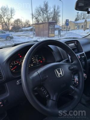 Melns Honda CR-V 2006 Rēzekne, ar dzinēja tilpumu 2.20 L un nobraukumu 243 tūkst. km par 2950 €, foto 4 vietnē AUTOMOTO.COM.LV