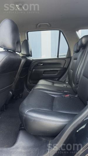 Melns Honda CR-V 2006 Rīga, ar dzinēja tilpumu 2.00 L un nobraukumu 297 tūkst. km par 1850 €, foto 7 vietnē AUTOMOTO.COM.LV