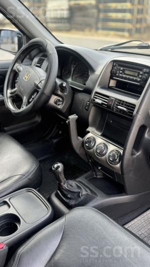 Melns Honda CR-V 2006 Rīga, ar dzinēja tilpumu 2.00 L un nobraukumu 297 tūkst. km par 1850 €, foto 19 vietnē AUTOMOTO.COM.LV