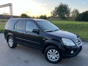 Black Honda CR-V 2006 in Vilnius, with an engine capacity of 2.20 L and mileage of 350 thousand km for 1850 €, photo 4 on AUTOMOTO.COM.LV