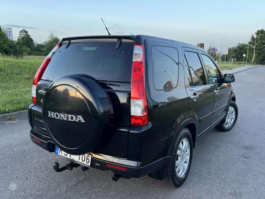 Black Honda CR-V 2006 in Vilnius, with an engine capacity of 2.20 L and mileage of 350 thousand km for 1850 €, photo 7 on AUTOMOTO.COM.LV