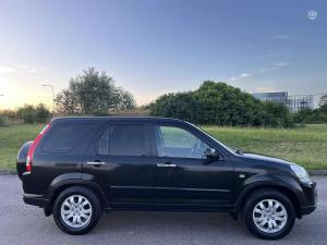 Black Honda CR-V 2006 in Vilnius, with an engine capacity of 2.20 L and mileage of 350 thousand km for 1850 €, photo 13 on AUTOMOTO.COM.LV