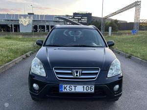 Black Honda CR-V 2006 in Vilnius, with an engine capacity of 2.20 L and mileage of 350 thousand km for 1850 €, photo 17 on AUTOMOTO.COM.LV